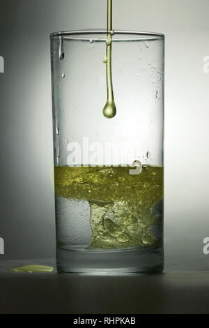 Water sloshing in glass Stock Photo - Alamy