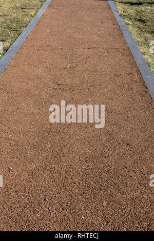 Rubber standard of athletics stadium running track Stock Photo - Alamy