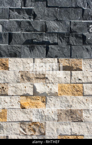 Decorative cubic stone wall as background texture Stock Photo - Alamy