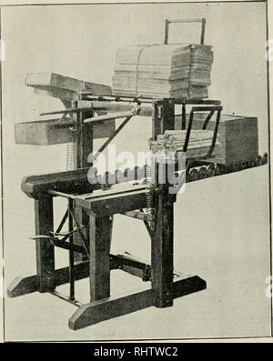 Lidding machine for packing boxes Stock Photo: 145335914 - Alamy