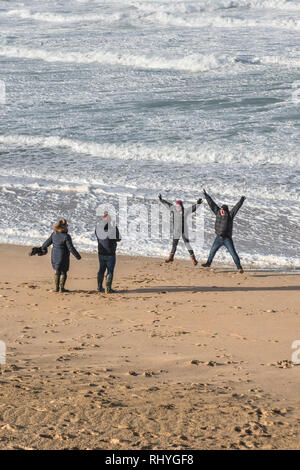 People having fun at the beach in the UK Stock Photo - Alamy