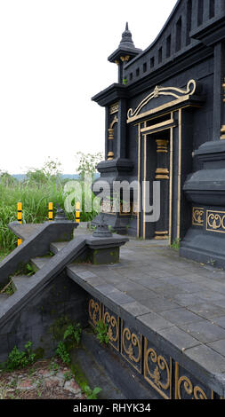 black stone carvings for yard fences Stock Photo - Alamy