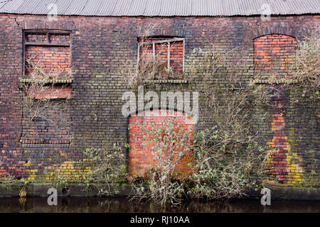 Bricked up windows and door of an old warehouse Stock Photo - Alamy