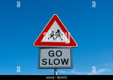 warning sign of children crossing road to school ahead uk Stock Photo ...