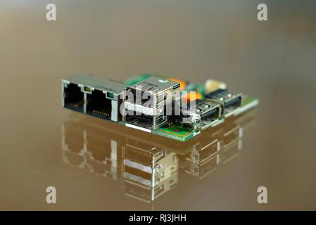 Integrated microprocessor and sockets on circuit of computer ...