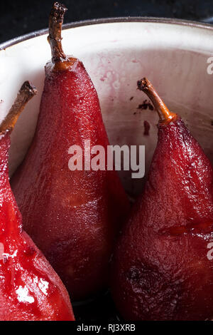 Pears in red wine dessert Stock Photo - Alamy