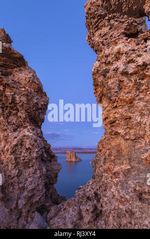 Tufa columns, seen through other tufa columns, at Mono Lake, California ...