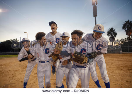 Baseball team, sports and men winning trophy at competition or game on ...