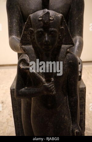 Detail of a statue of Amun with Horemheb before him. 18th Dynasty ...