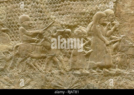 Stone carved relief depicting an prisoners captured after the attack on ...