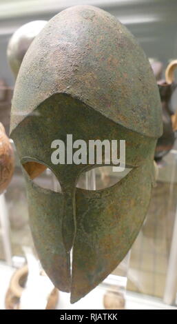 A Corinthian helmet, 6th century B.C. Large helmet skull with an ...