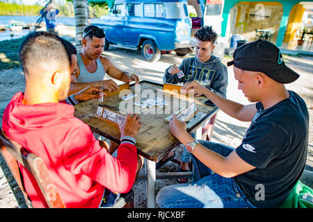Hands of domino players Stock Photo - Alamy
