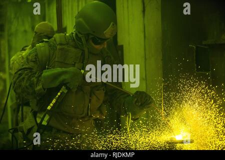 A Marine from Methods of Entry School on Marine Corps Base Quantico ...