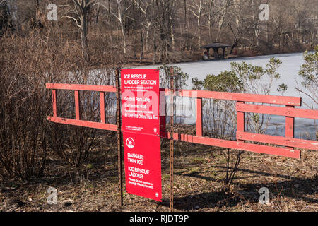 Ice Rescue Ladder Station Sign with the Frozen Lake in background ...