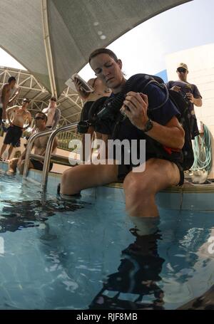 Lt. Allison Moon looks at the secondary display to ensure that close ...