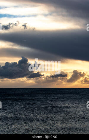 Moody grey seascape background, rock in the Irish Sea at Seascale beach ...