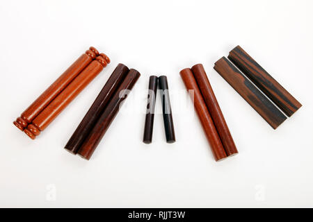 Hardwood Claves. Rosewood. Different sizes and shapes Stock Photo - Alamy