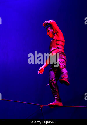 circus performers tight rope act Stock Photo - Alamy