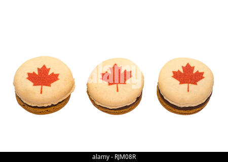 Macarons decorated with red maple leaves made for Canada Day, on a ...