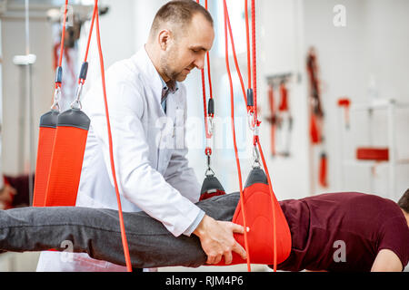 physiotherapist doing a treatment to a patient Stock Photo - Alamy