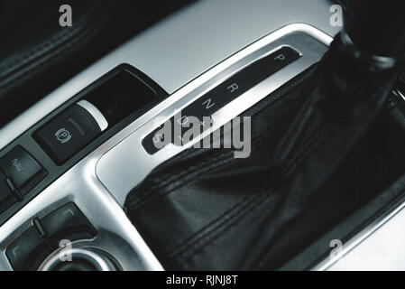 Automatic gear stick (transmission) of a modern car, multimedia and ...