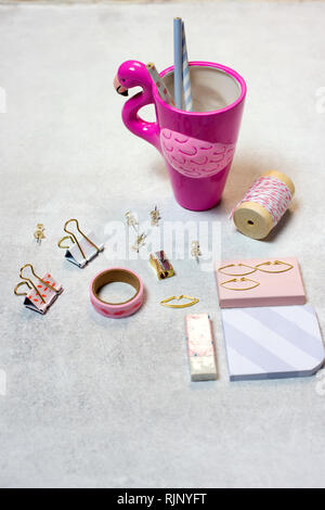 Feminine desktop with gold and pink stationery including a keyboard and ...