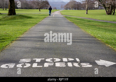 Warning sign on golf course Stock Photo - Alamy