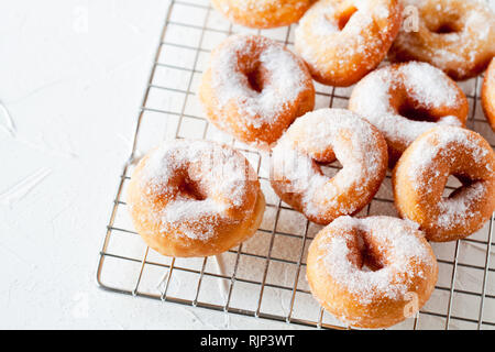 Bunch of homemade donuts with powdered sugar Stock Photo - Alamy