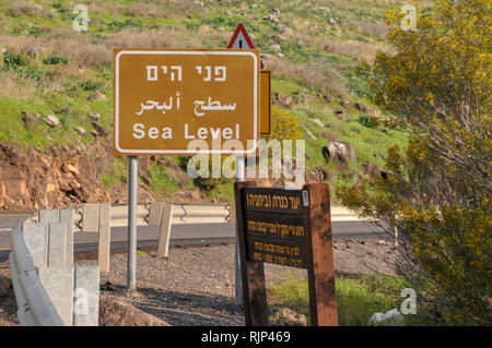 Israel, Lower Galilees, View of the Sea of Galilee. Sea level sign ...