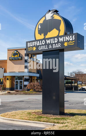 Buffalo Wild Wings restaurant grill and bar logo and sign above ...