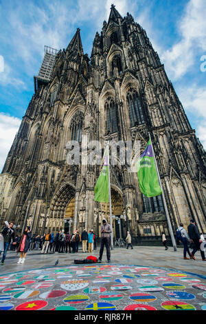 COLOGNE, GERMANY - November 07, 2018: Tourists walk around beneath ...