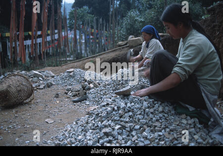 Women breaking rock for road construction in Kowloon, China, circa 1930 ...