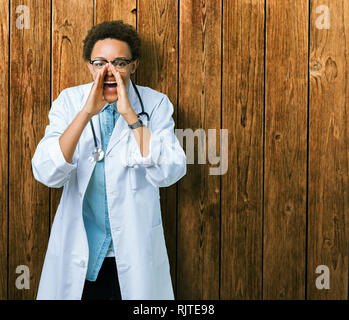 Angry and upset young woman doctor, female healthcare worker sulking ...