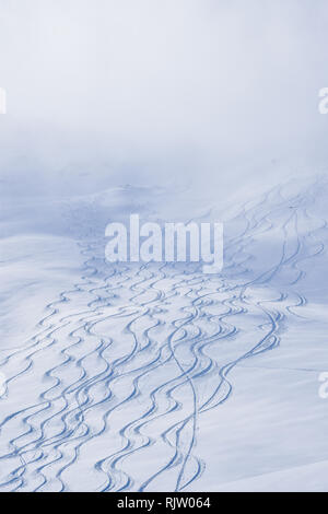 Abstract lines in snow from skiing off piste Stock Photo - Alamy