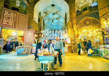 A merchant in the bazaar of Isfahan Stock Photo - Alamy