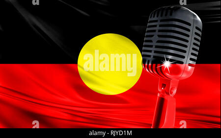 Microphone on a background of a blurry Australian Aboriginal flag close ...