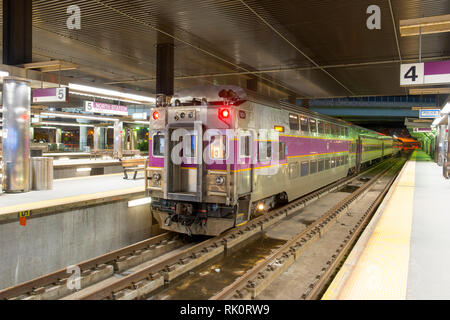 MBTA Commuter Rail bilevel coach at night in North Station, Boston ...