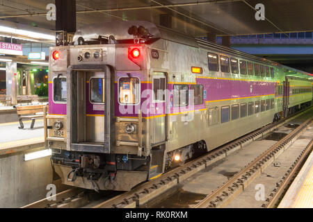 MBTA Commuter Rail bilevel coach at night in North Station, Boston ...