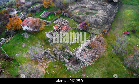 A mountain village wakes up in the mist at the end of winter in Ancares ...