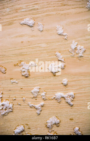 Wooden ground slightly covered with snow Stock Photo - Alamy