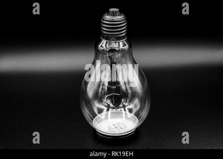 Transparent lightbulb with filament and Edison Screw or “ES” lamp ...