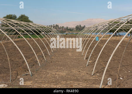 Greenhouse frames in arable farmland field rural countryside setting ...