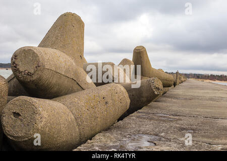 Mole made from huge conical form stone at Liepaja, Latvia Stock Photo ...