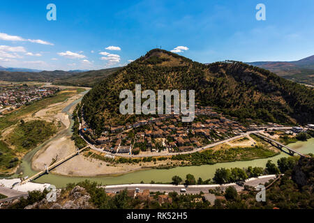 A scenic view of a city river surrounded with buildings during a ...