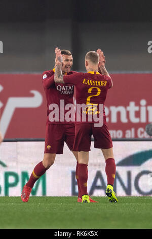 Edin Dzeko (R) and Rick Karsdorp (L) of Roma talk each other during the ...