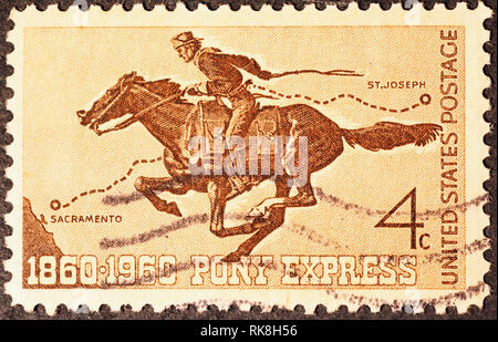 Legendary pony express on ancient postage stamp Stock Photo - Alamy
