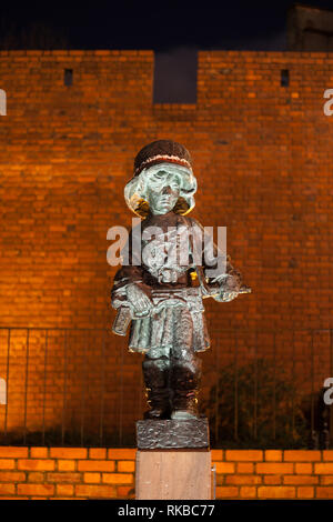 Monument of little boy insurgent in oversized german helmet and boots ...