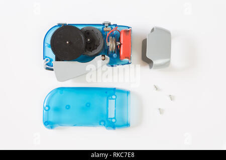 Interior of a dyno torch, dynamo wind up flashlight hand pressing crank ...