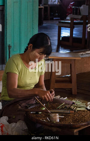 Burmese woman hand makes cigars with local tobacco, Inle Lake, Myanmar ...