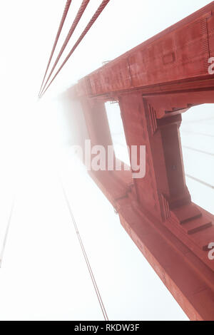 A low angle shot of a Golden Gate bridge in San Francisco against a ...